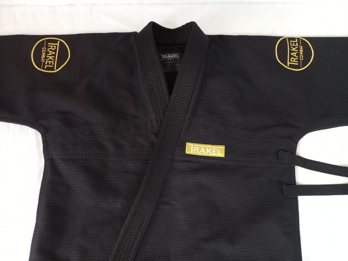Trakel Combat - Kimono preto tag dourada